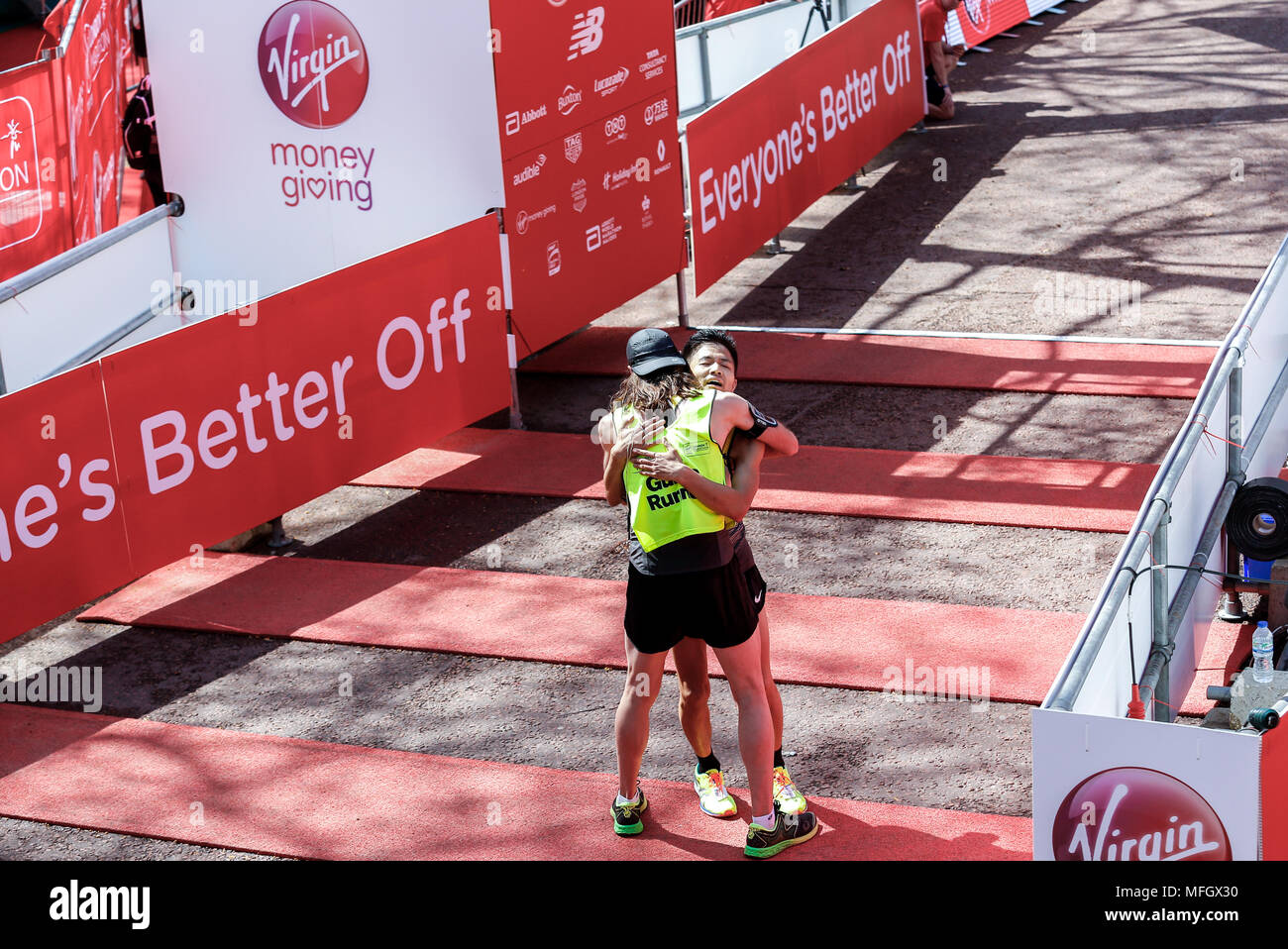 Yap TIEN-FUNG tired and emotional after crossing the finish line in ...