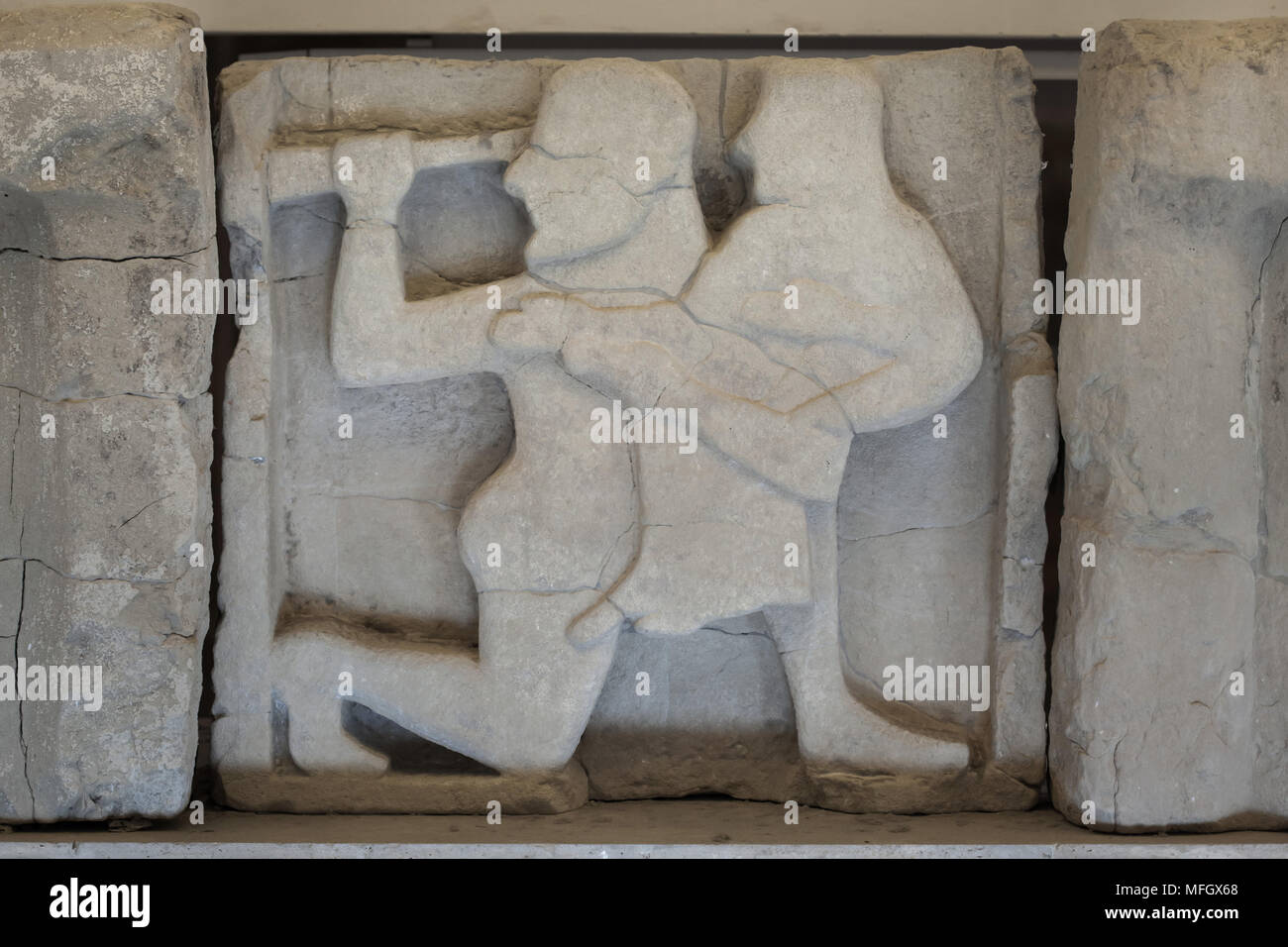 Tityos attempts to rape Leto. Archaic sandstone metope from the Heraion ...