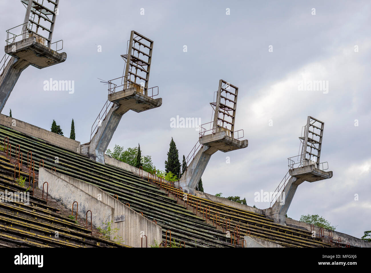 Abandoned and falling apart swimming pool with tribunes, Tbilisi ...