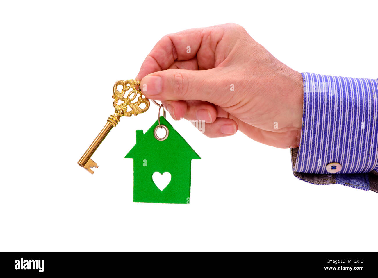 house key on ring in hand of real estate agent Stock Photo - Alamy