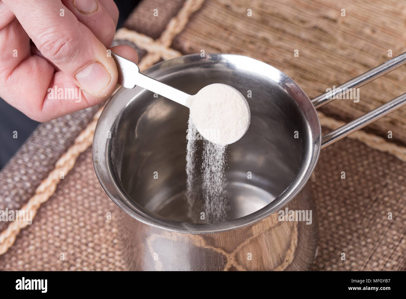 Adding water to white powder hi-res stock photography and images - Alamy