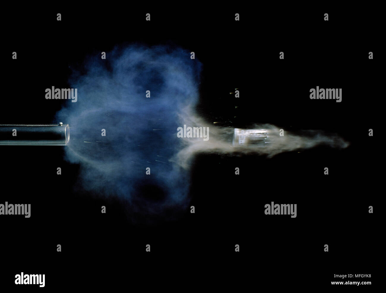 DISCHARGE OF TWELVE-BORE SHOTGUN Picture taken 4.3 milliseconds after ...