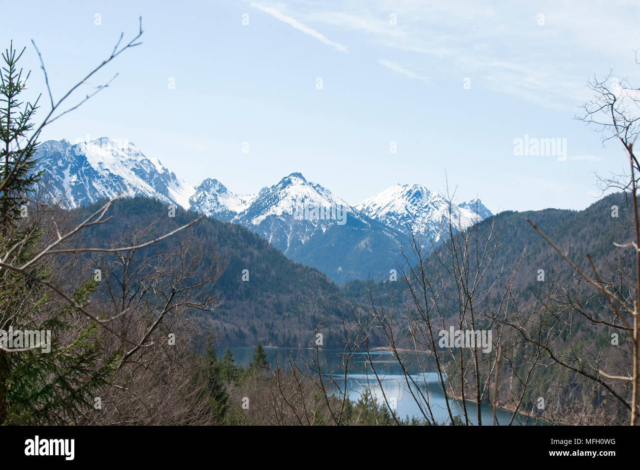 View across Lake Alpsee showing the mountains from left to right of ...