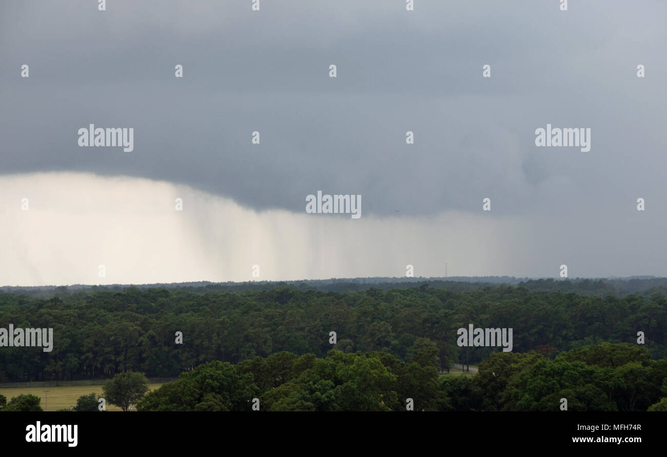 Rain falling from clouds Stock Photo - Alamy