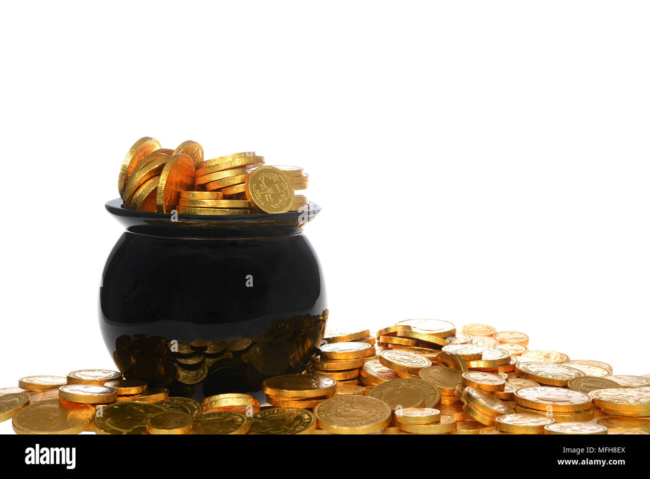 Pot of gold filled with gold coins piled high and spilling over ...