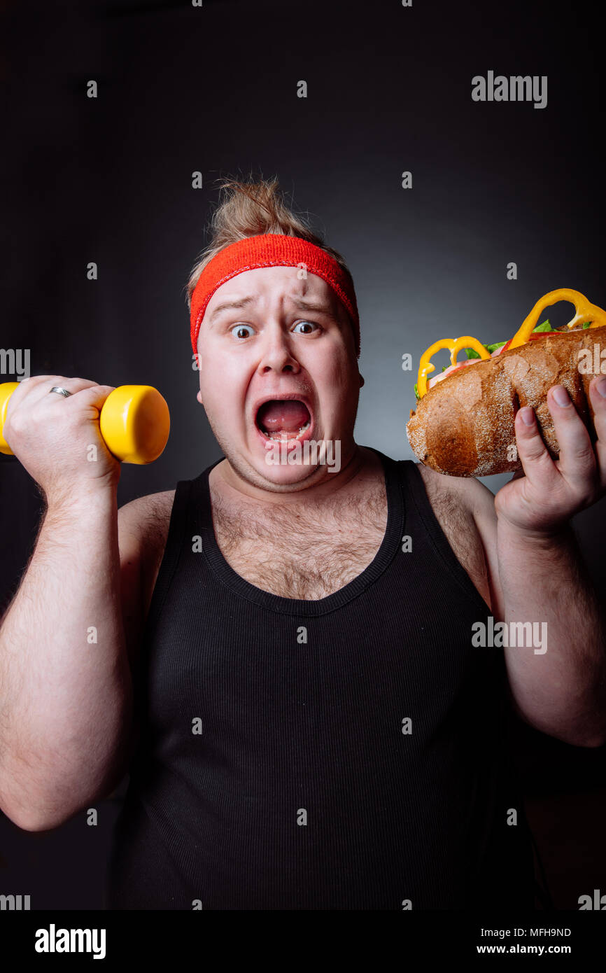 Overweight obese man lazy hi-res stock photography and images - Alamy