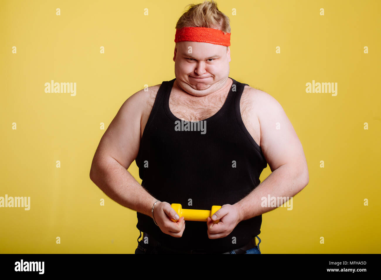 Gym big man small hi-res stock photography and images - Alamy