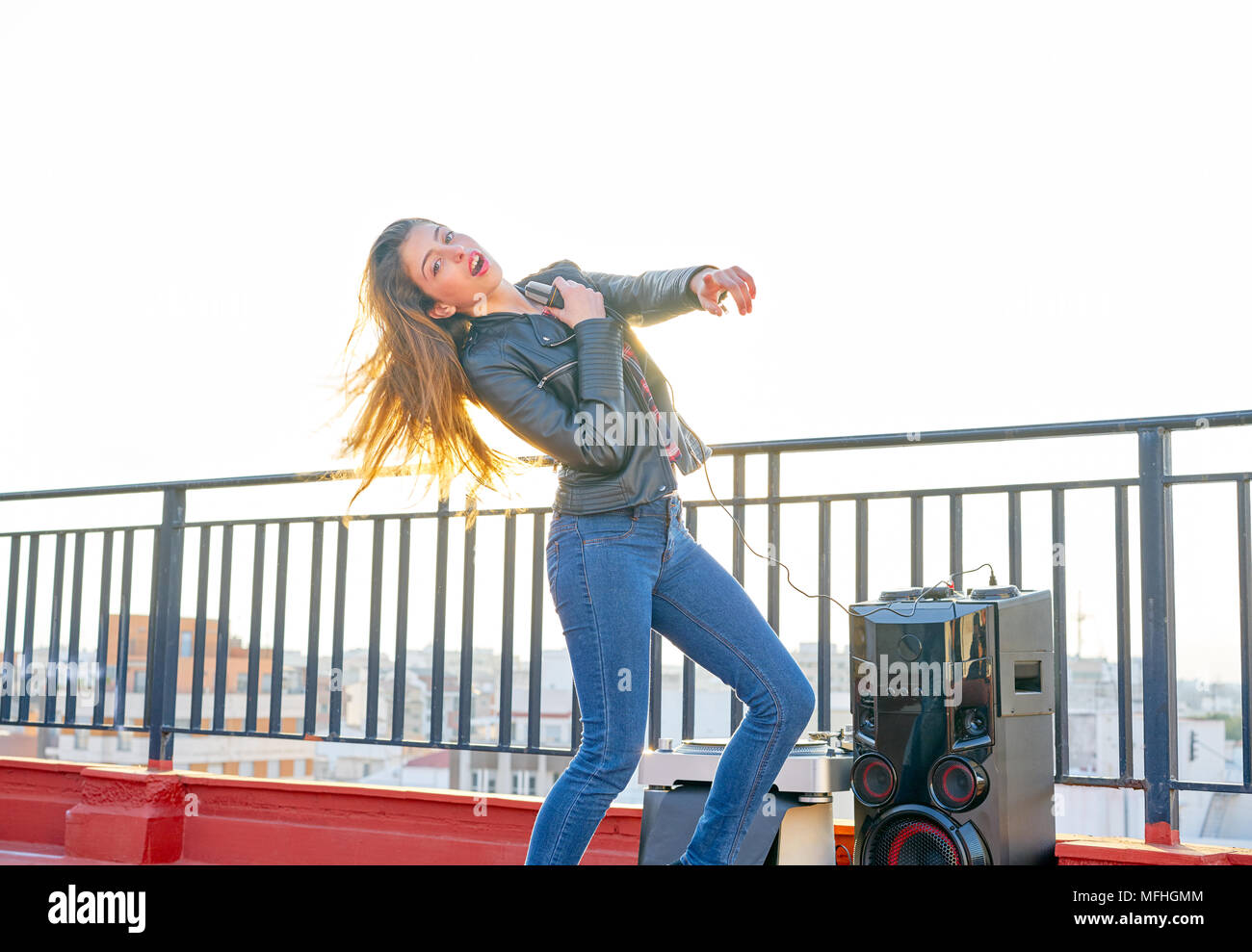 Girl singer sunset hi-res stock photography and images - Alamy