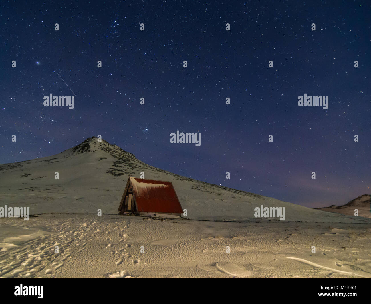 Emergency hut at night Stock Photo - Alamy