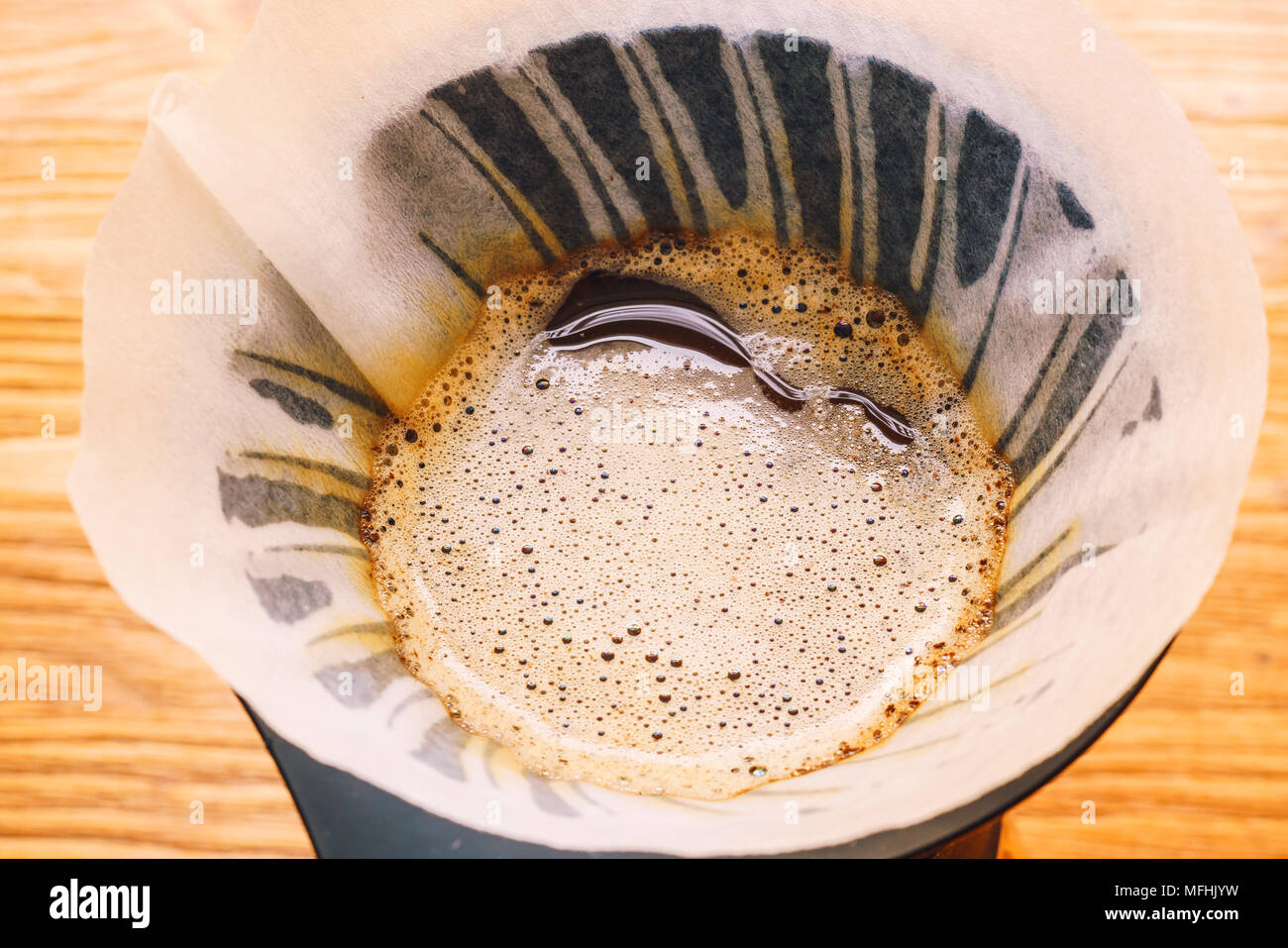 Drip brewing filtered coffee Stock Photo - Alamy