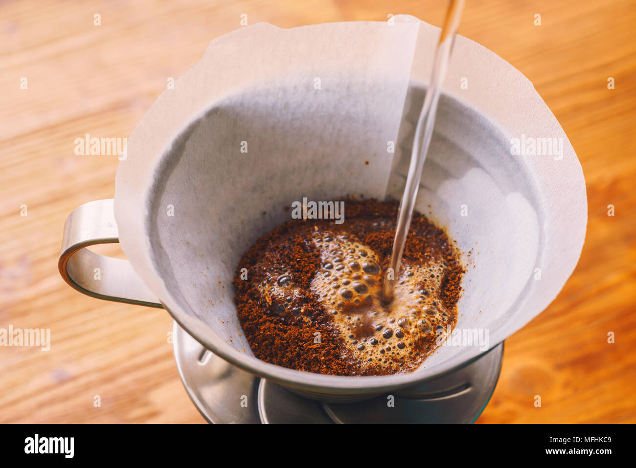 Drip brewing filtered coffee Stock Photo - Alamy