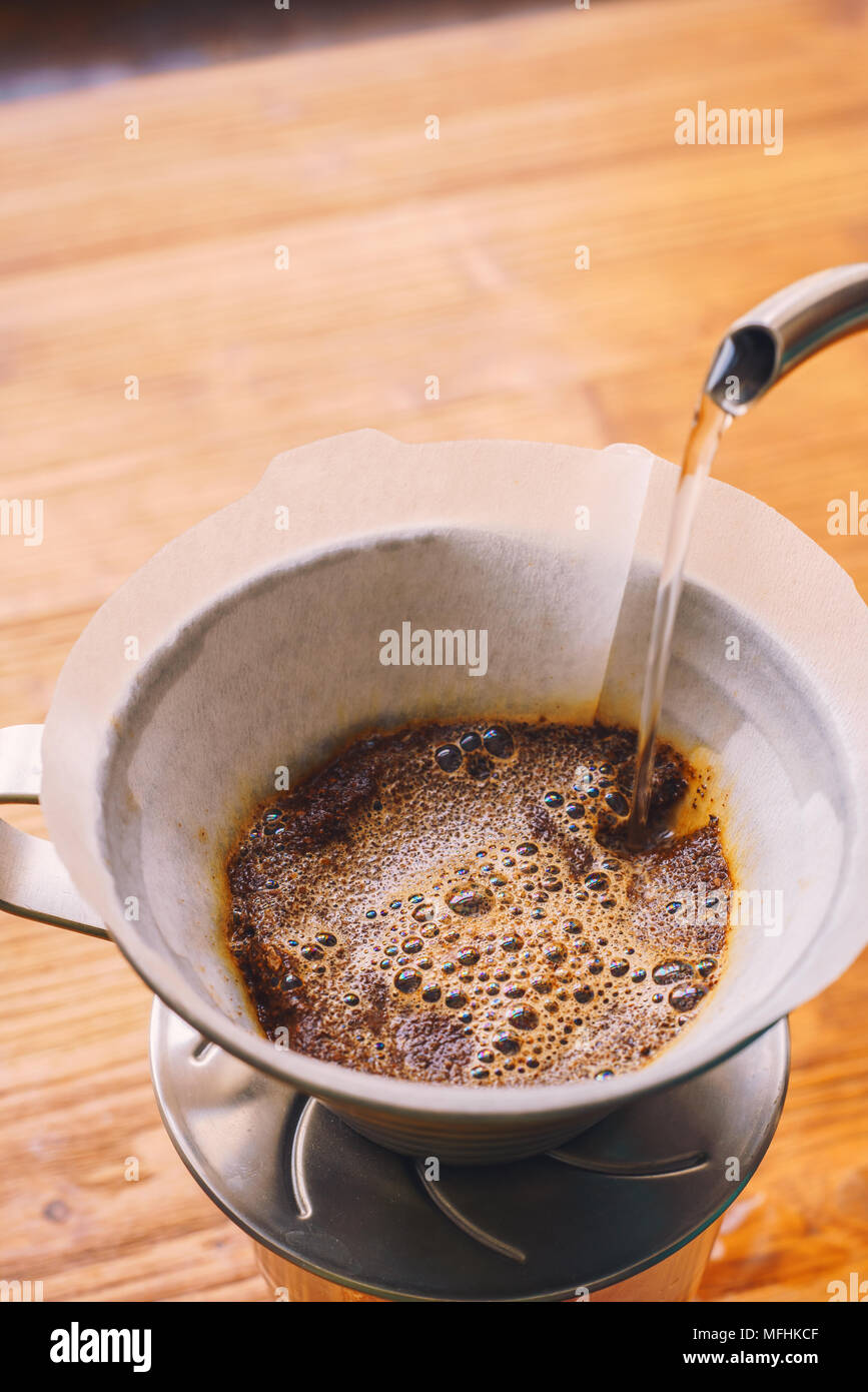 Drip brewing filtered coffee Stock Photo - Alamy