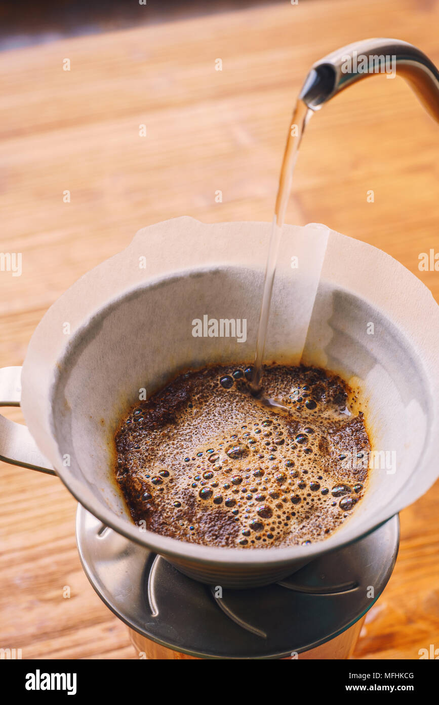 Drip brewing filtered coffee Stock Photo - Alamy