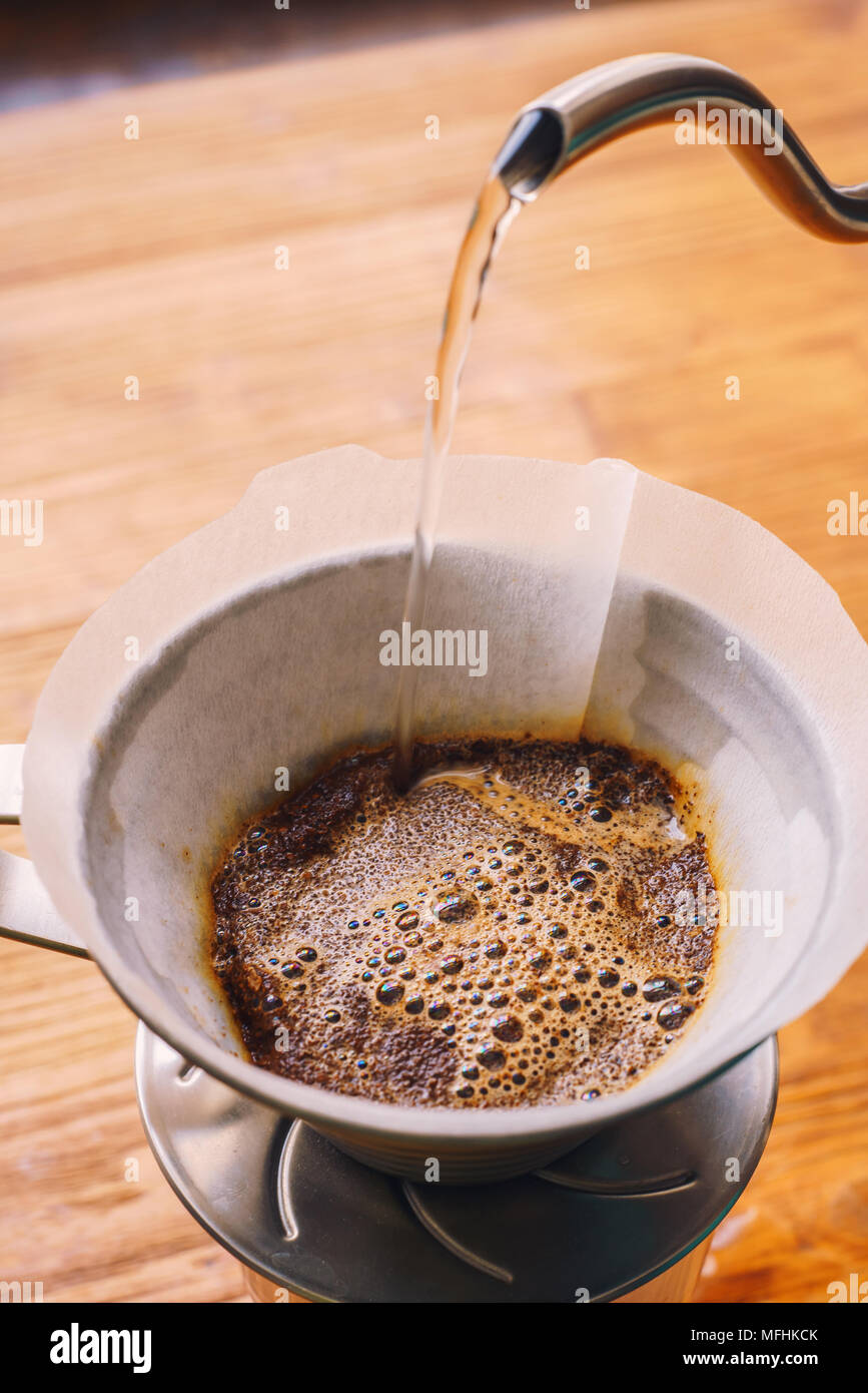 Drip brewing filtered coffee Stock Photo - Alamy