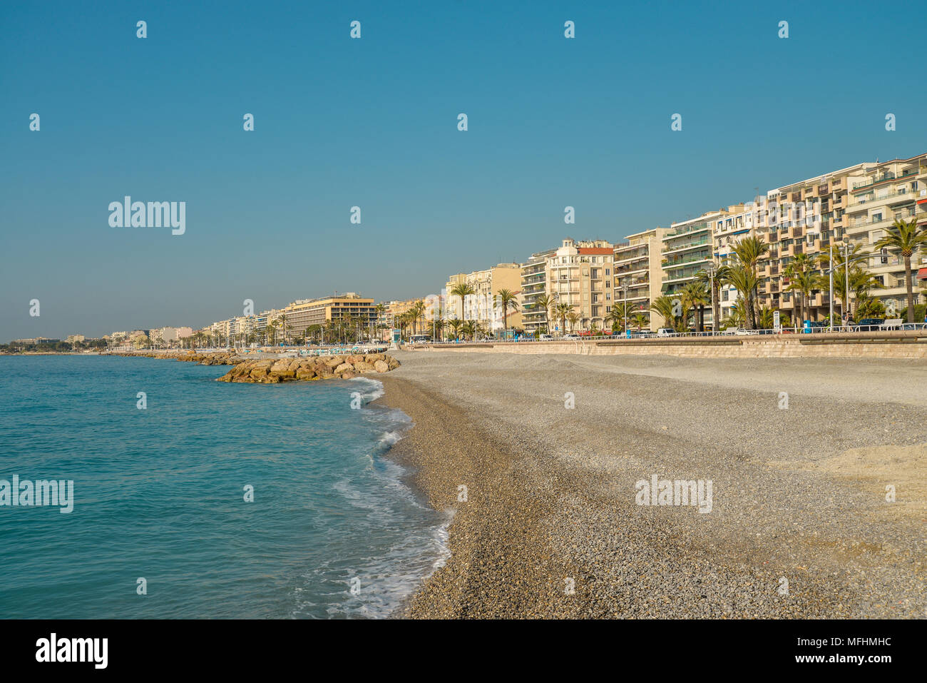 Empty beach in Nice and Promenade des Anglais - the main embankment of ...
