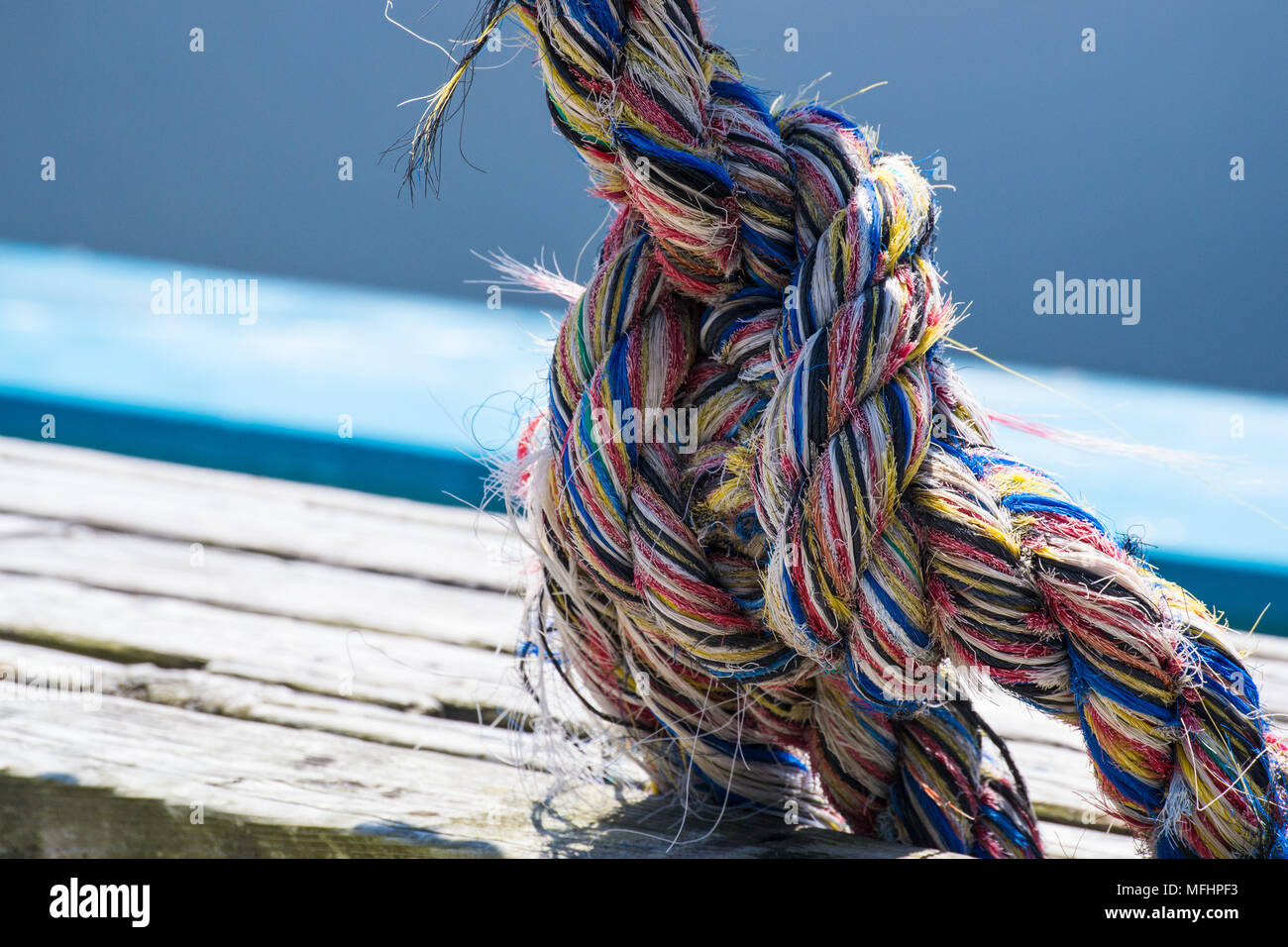Colorful boating rope showing life on the docks Stock Photo - Alamy