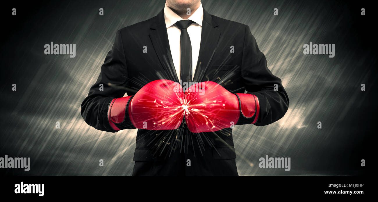 Clashing boxing gloves hi-res stock photography and images - Alamy