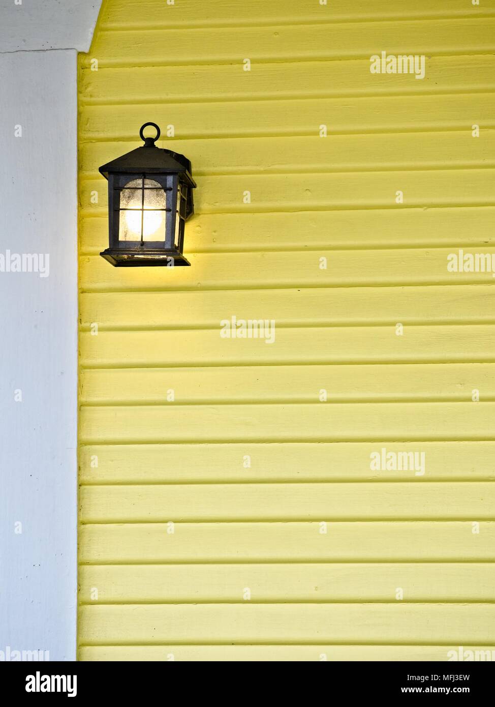 Yellow Exterior Wall with Light Fixture on a Old Building in Old Town ...