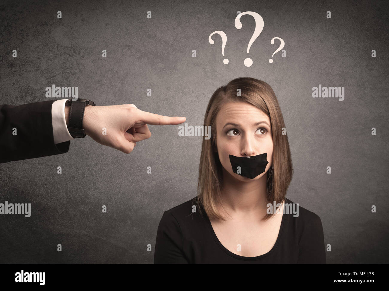 Caucasian business hand pointing at female employee with big white ...