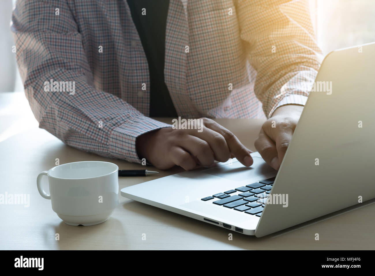 man working computer table hand touching laptop business strategy ...