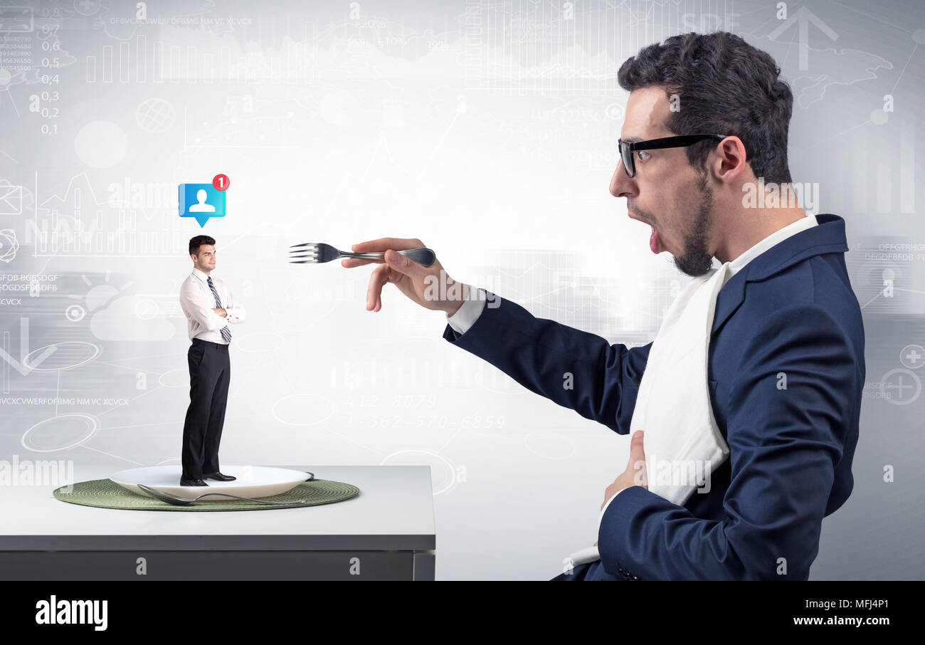 Giant businessman eating small man with financial background Stock ...