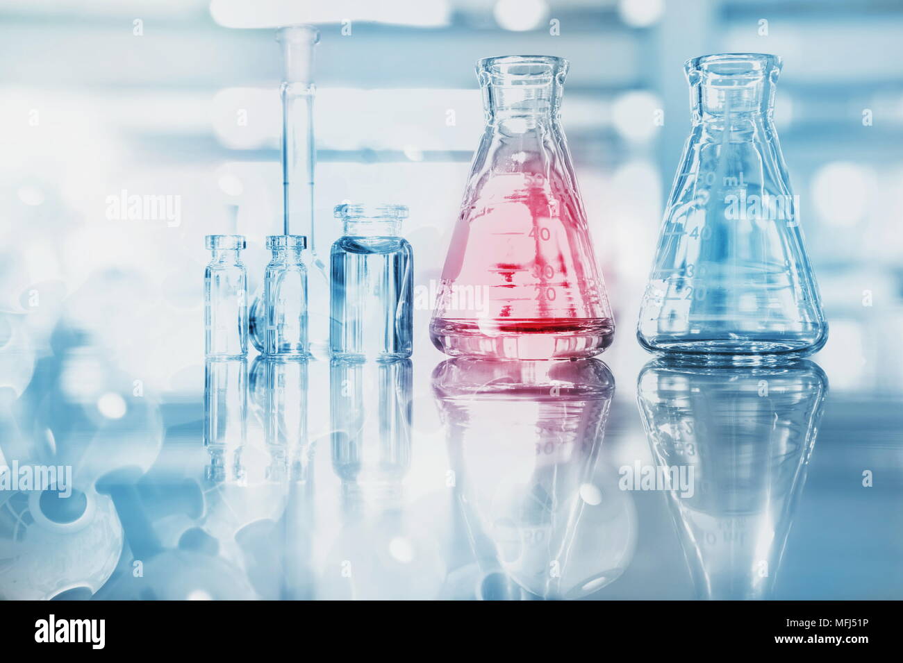 blue red glass flask vial and chemical structure in research medical ...