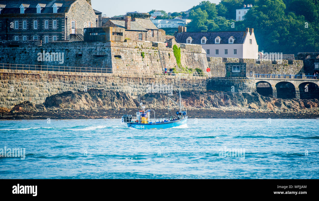 Traditional Guernsey crab and lobster boat coming into St. Peter Port ...