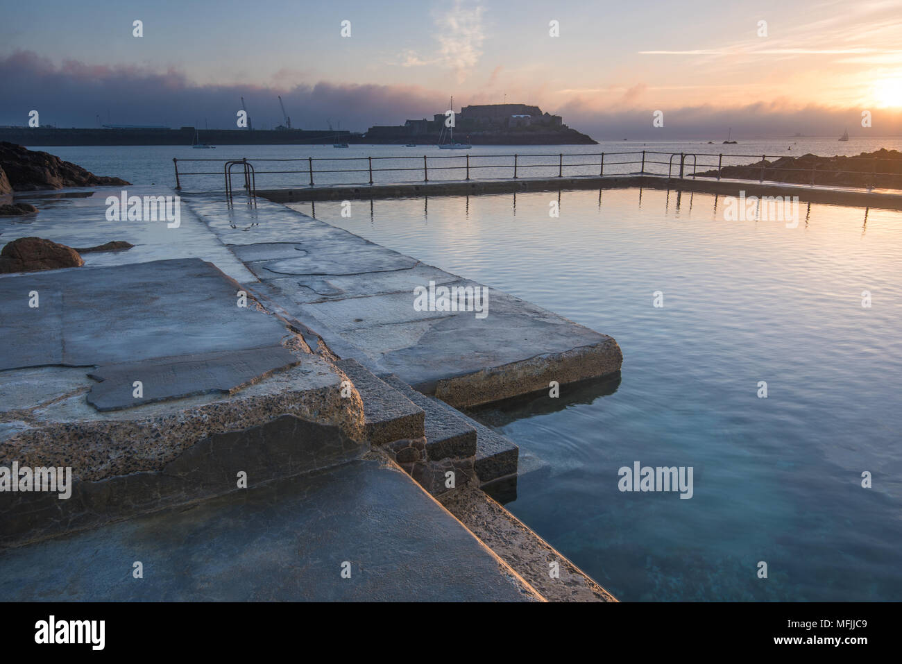 The Bathing pools and Castle Cornet in the background, St. Peters Port ...