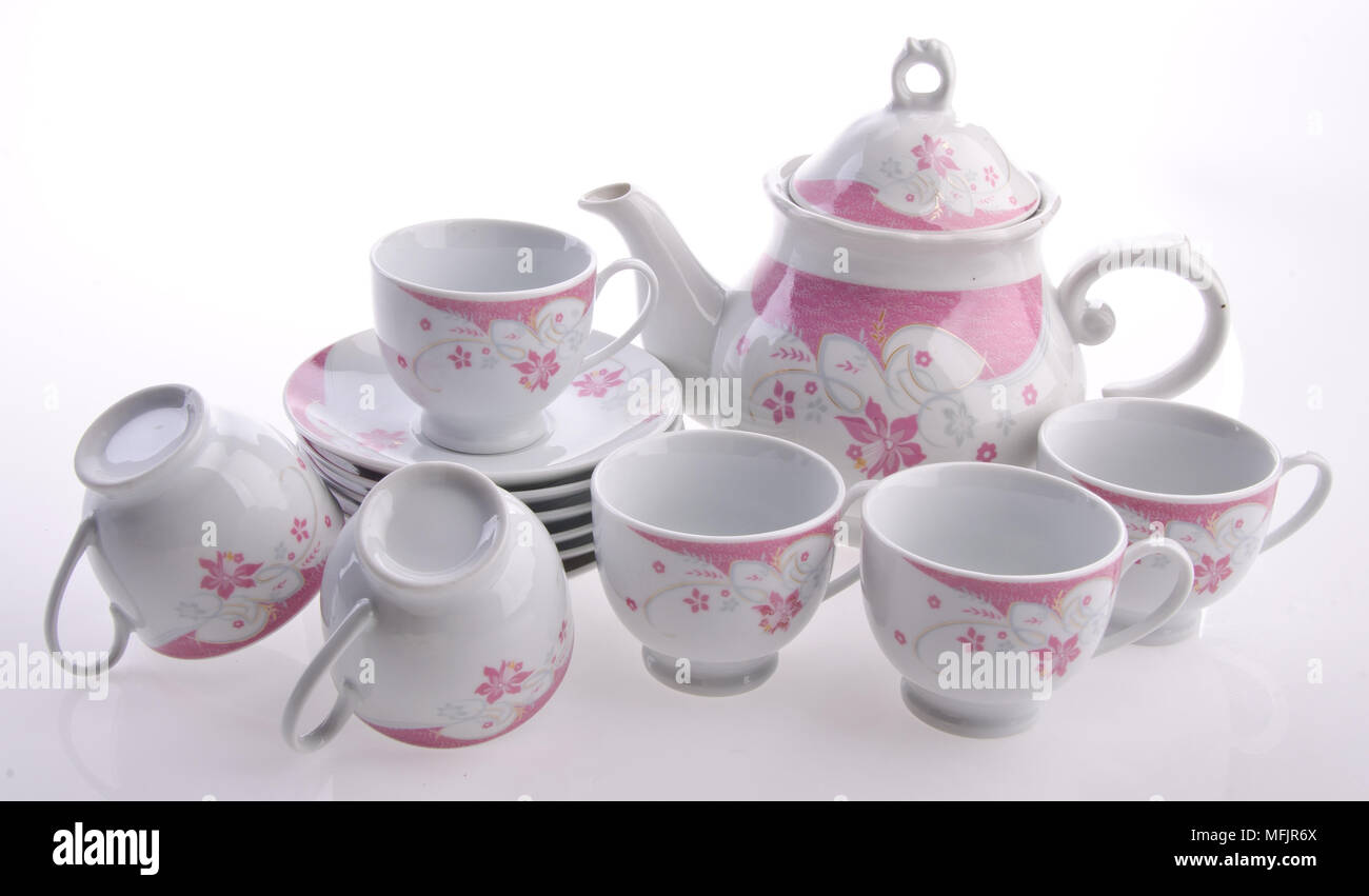 tea pot set, Porcelain tea pot and cup on white background Stock Photo ...