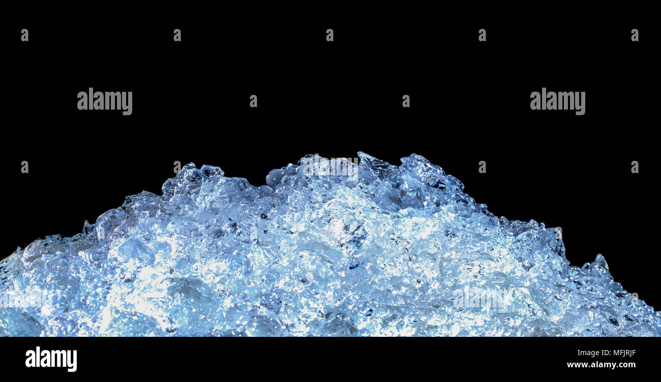 Pile of crushed ice cubes on dark background with copy space. Crushed ...