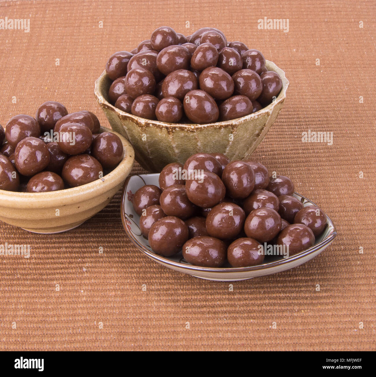 chocolate balls. chocolate balls in bowl on a background Stock Photo ...