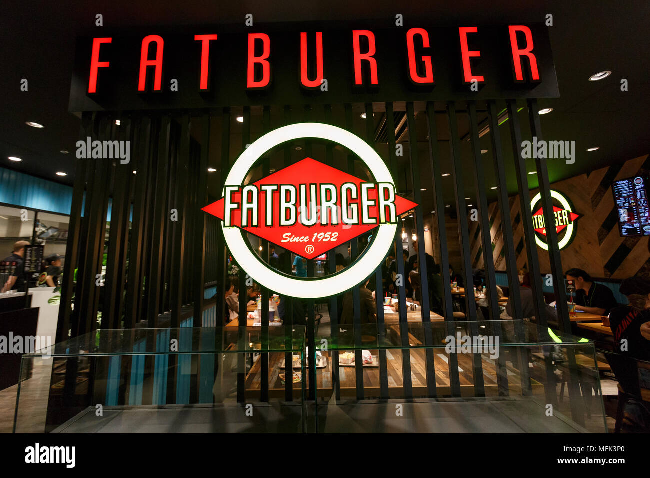 A logo of FATBURGER on display at Tokyo's new store in MAGNET by ...