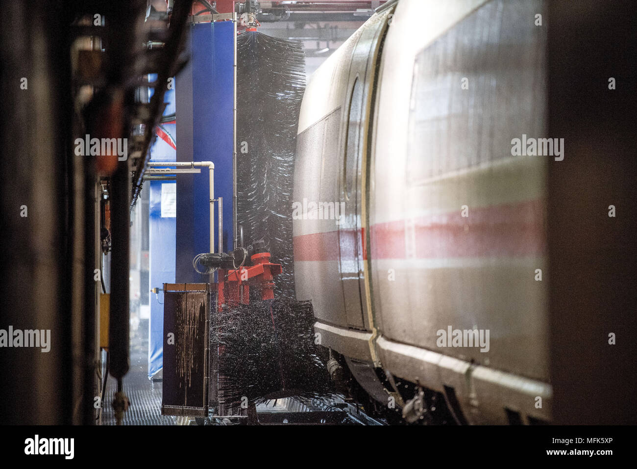 26 April 2018, Germany, Frankfurt: Brushes at the train washing system ...