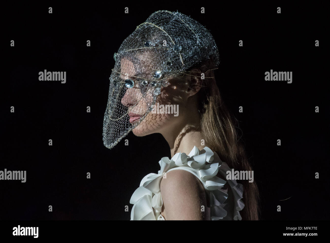 Barcelona, Catalonia, Spain. 26th Apr, 2018. A model walks the runway ...