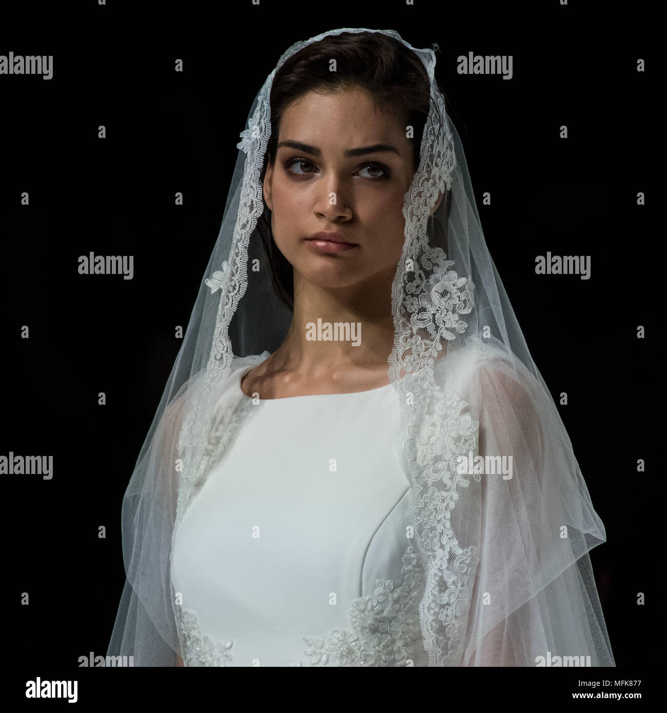 Barcelona, Catalonia, Spain. 26th Apr, 2018. A model walks the runway ...
