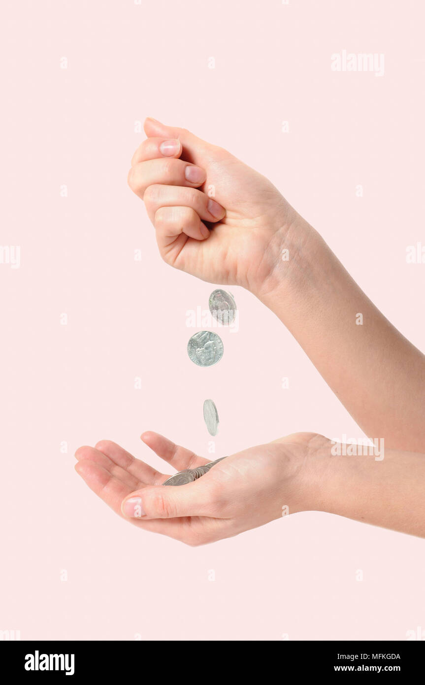 Gold coins falling on woman hi-res stock photography and images - Alamy