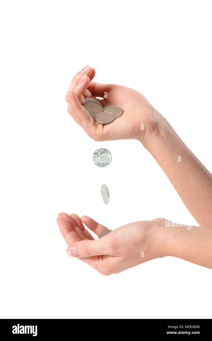 Money falling in the hands Cut Out Stock Images & Pictures - Alamy