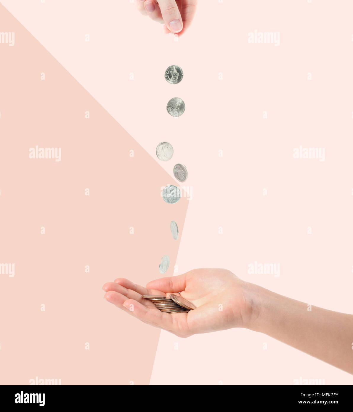 Female hands and falling coins on white background. Coins in palm Stock ...