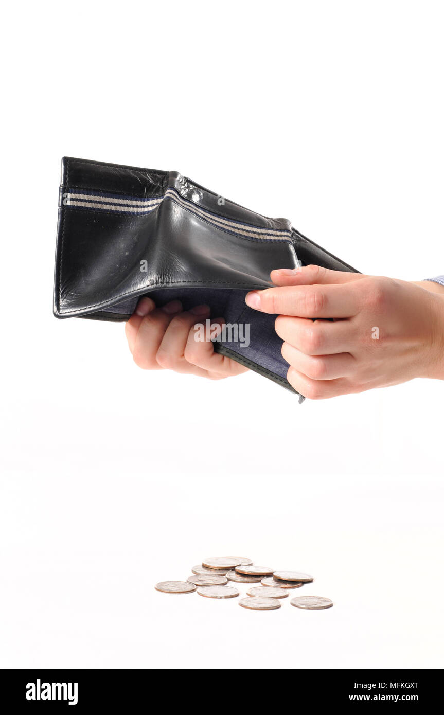 Hand holds empty wallet and falling out metal coins. Female hands and ...