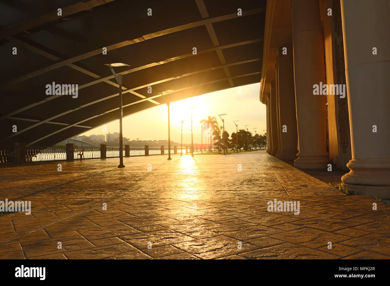 under the bridge at sunset Stock Photo - Alamy