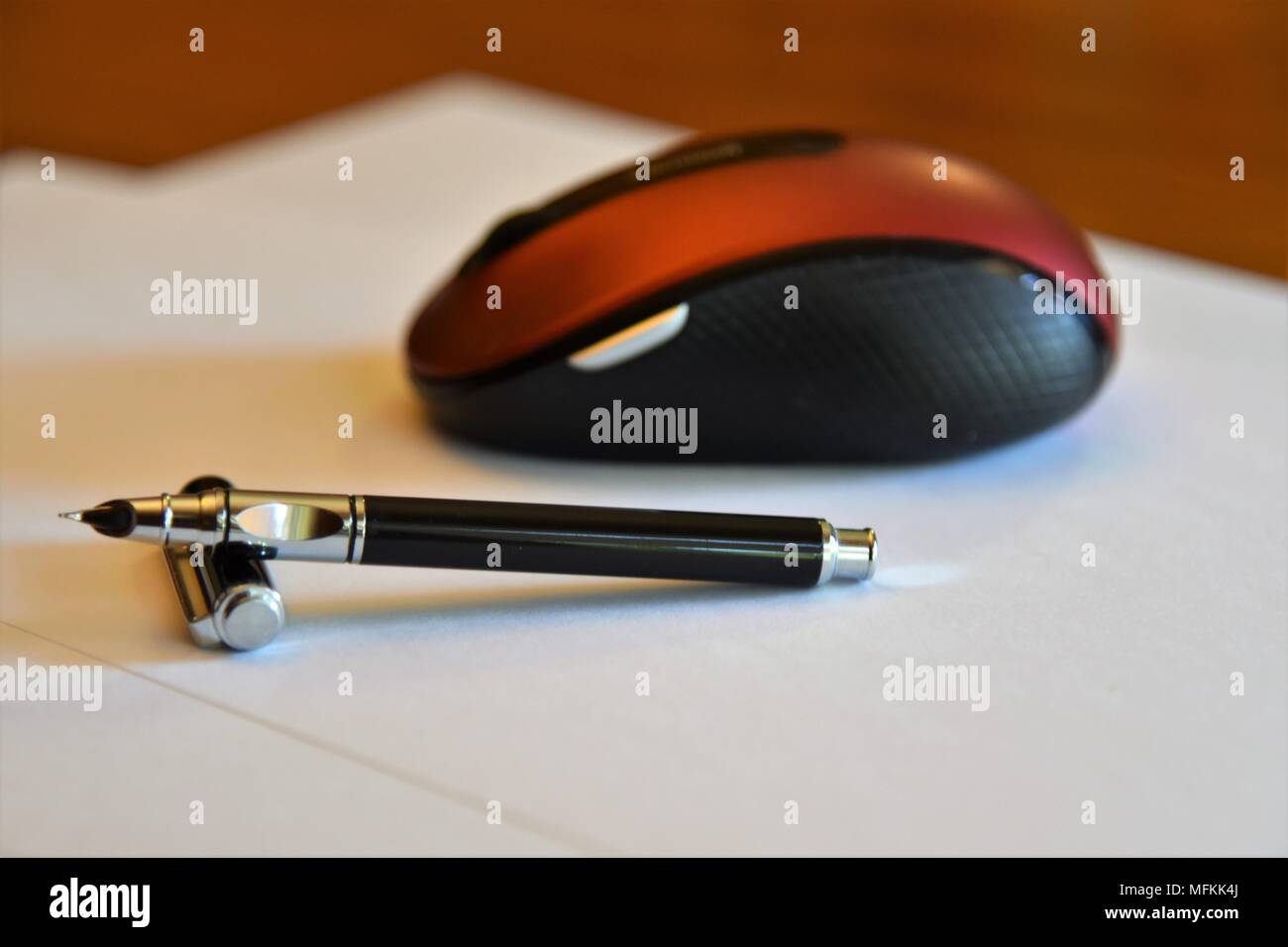 Fountain pen and computer mouse Stock Photo - Alamy