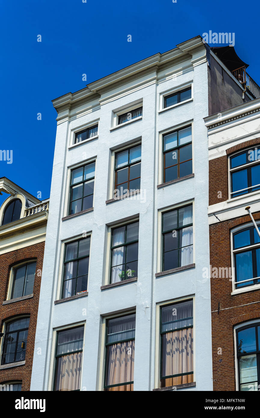 Old historical bend building in the capital of the Netherlands ...