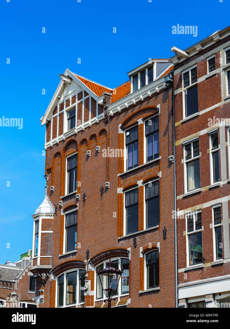 Old historical bend building in the capital of the Netherlands ...