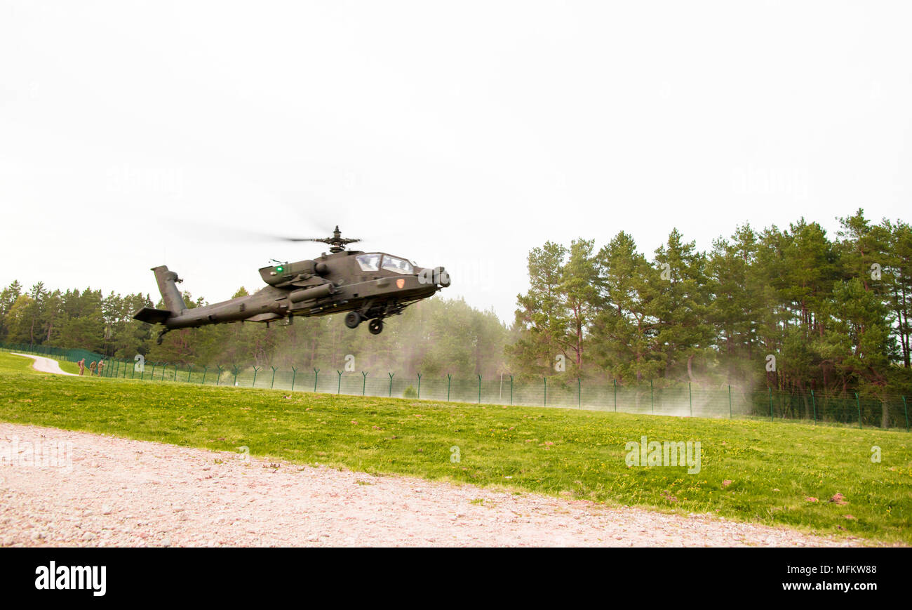 A Boeing AH-64 Apache moves to the staging area in preparation for a ...