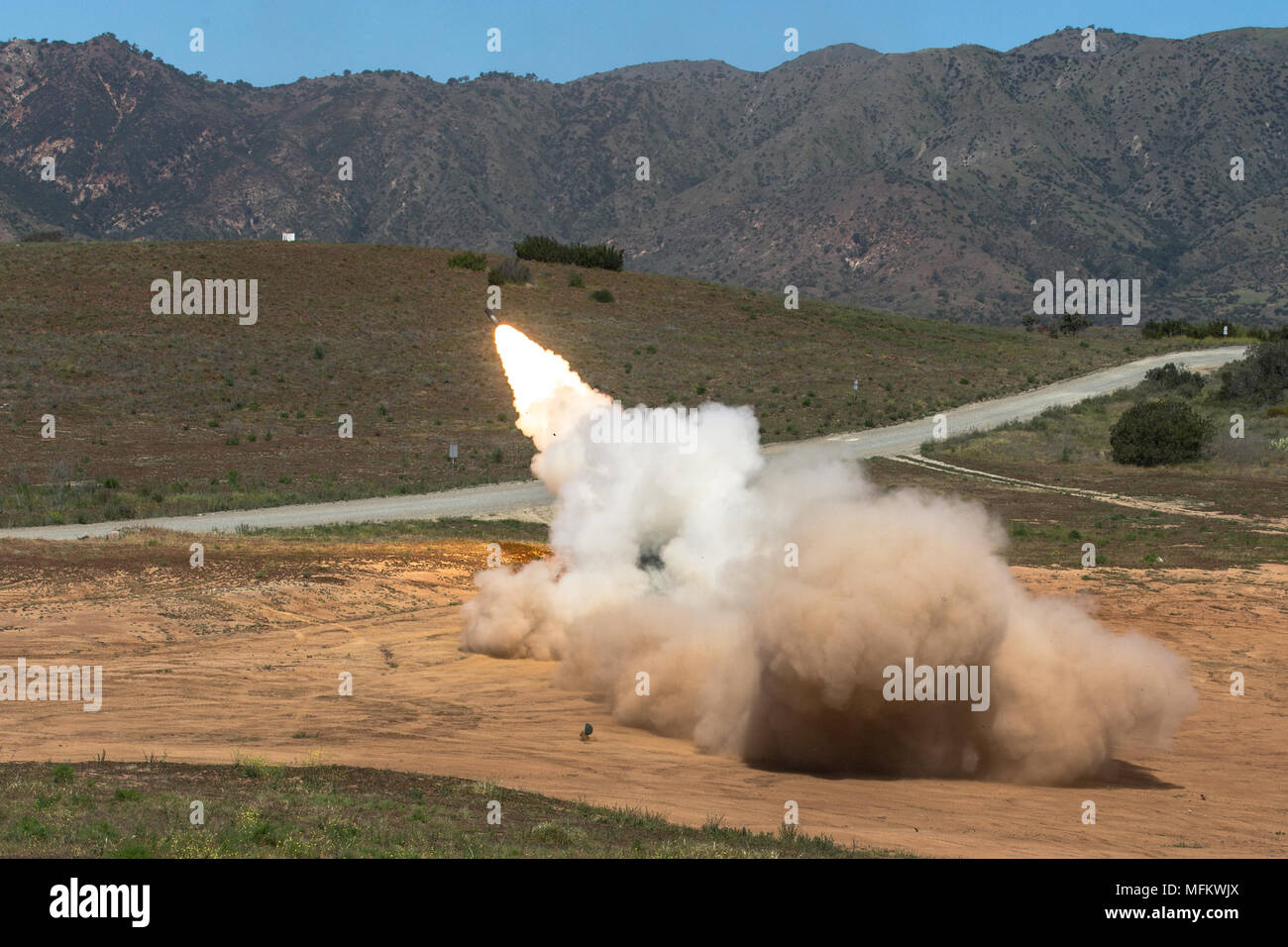 A High Mobility Artillery Rocket System is fired by U.S. Marines with ...