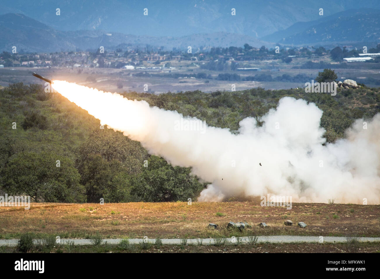 A High Mobility Artillery Rocket System is launched by U.S. Marines ...