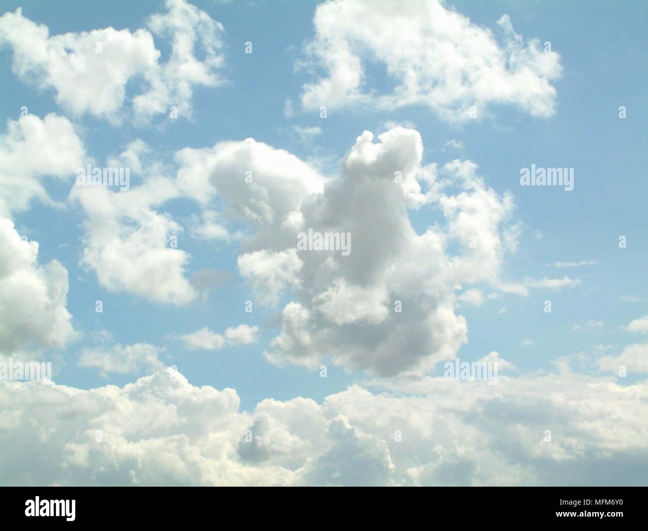Floating cotton wool clouds hi-res stock photography and images - Alamy