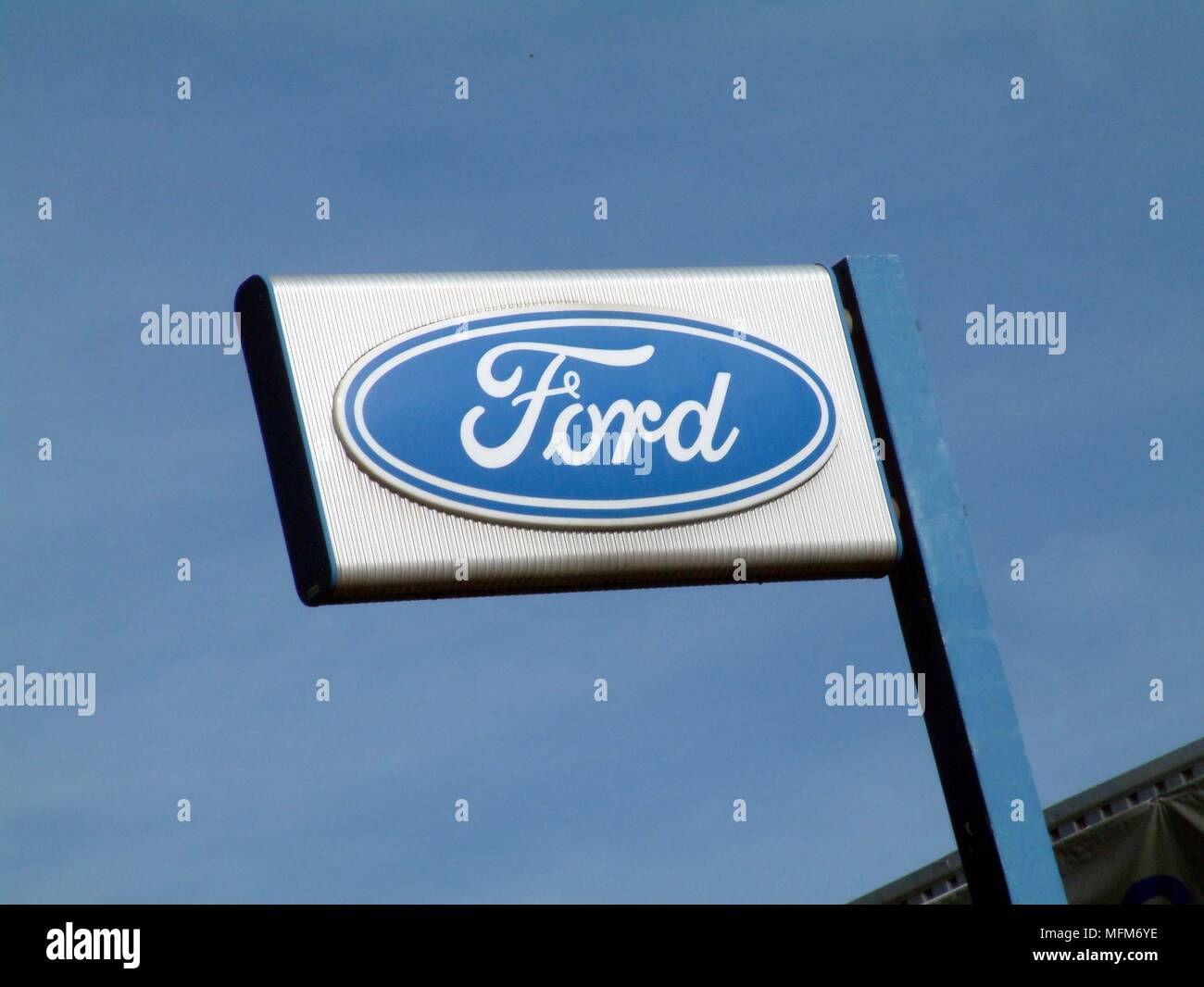 Ford Moter Company sign positioned on a sales forecourt displaying ...