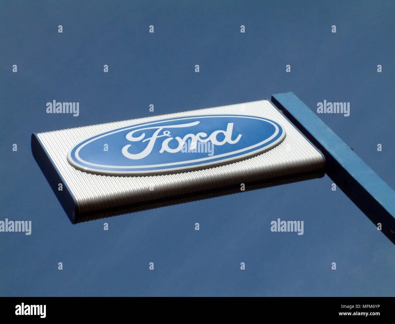 Ford Moter Company sign positioned on a sales forecourt displaying ...