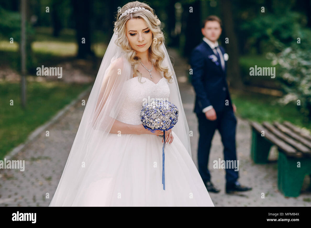 Beautiful wedding couple hugs hi-res stock photography and images - Alamy